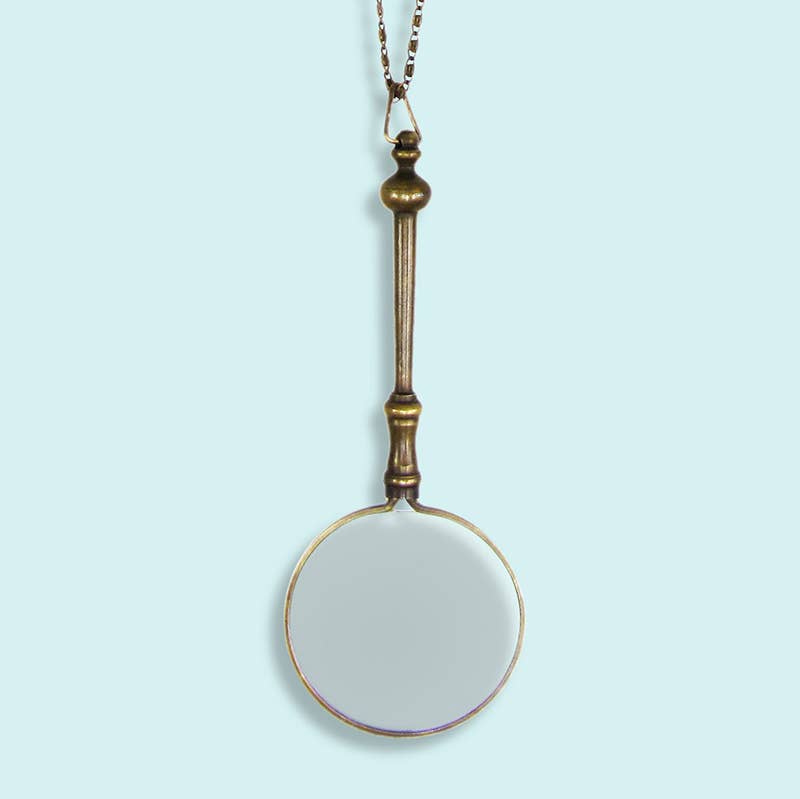 Ornate Magnifying Glass – One Strange Bird